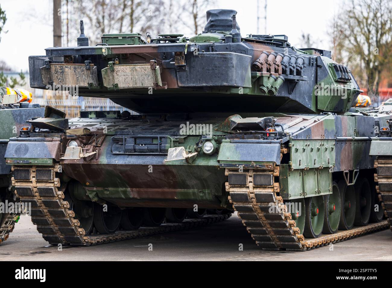 A rear view of a German Leopard 2 main battle tank loaded on a flatbed ...