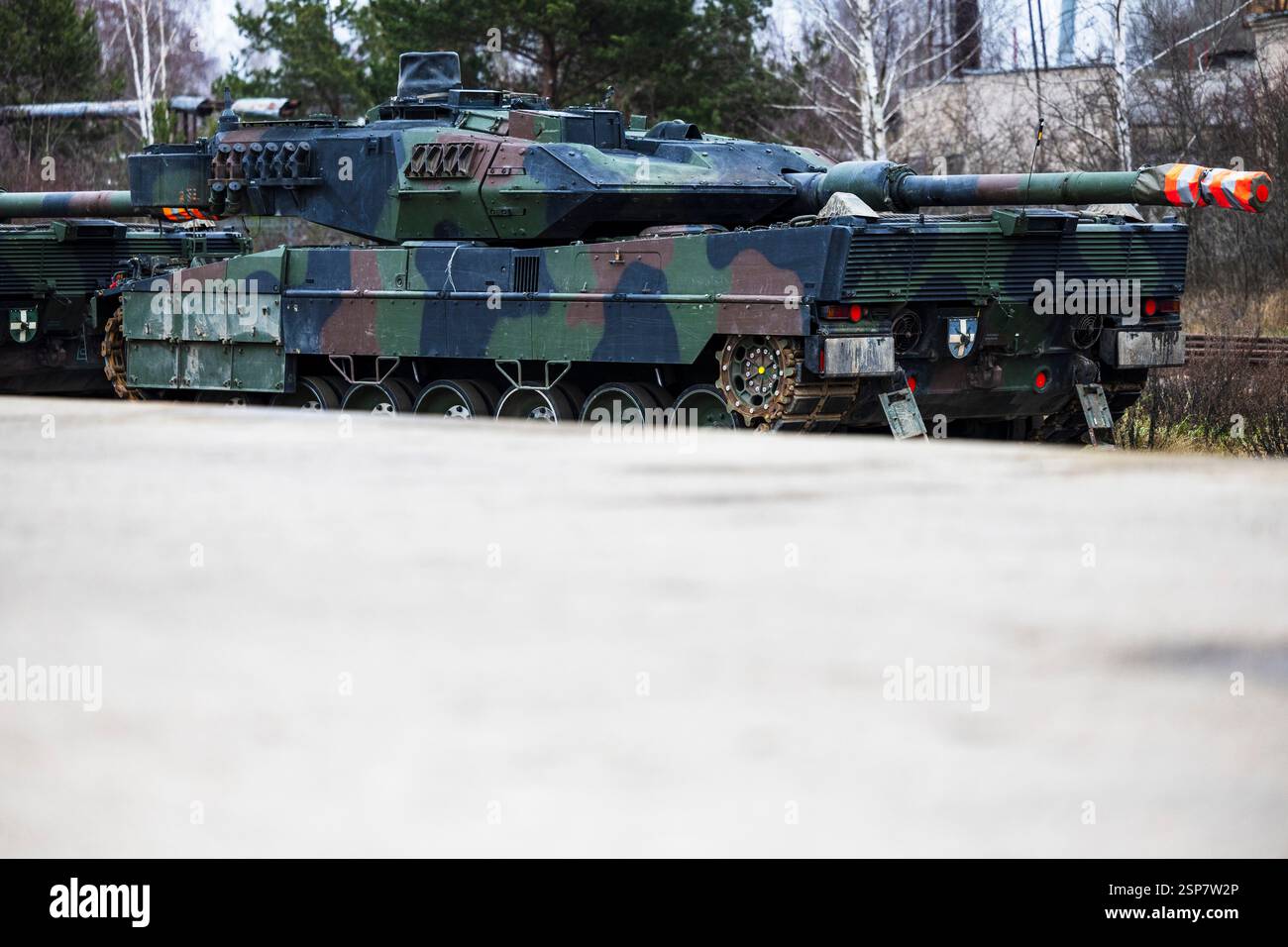 A rear view of a German Leopard 2 main battle tank loaded on a flatbed ...