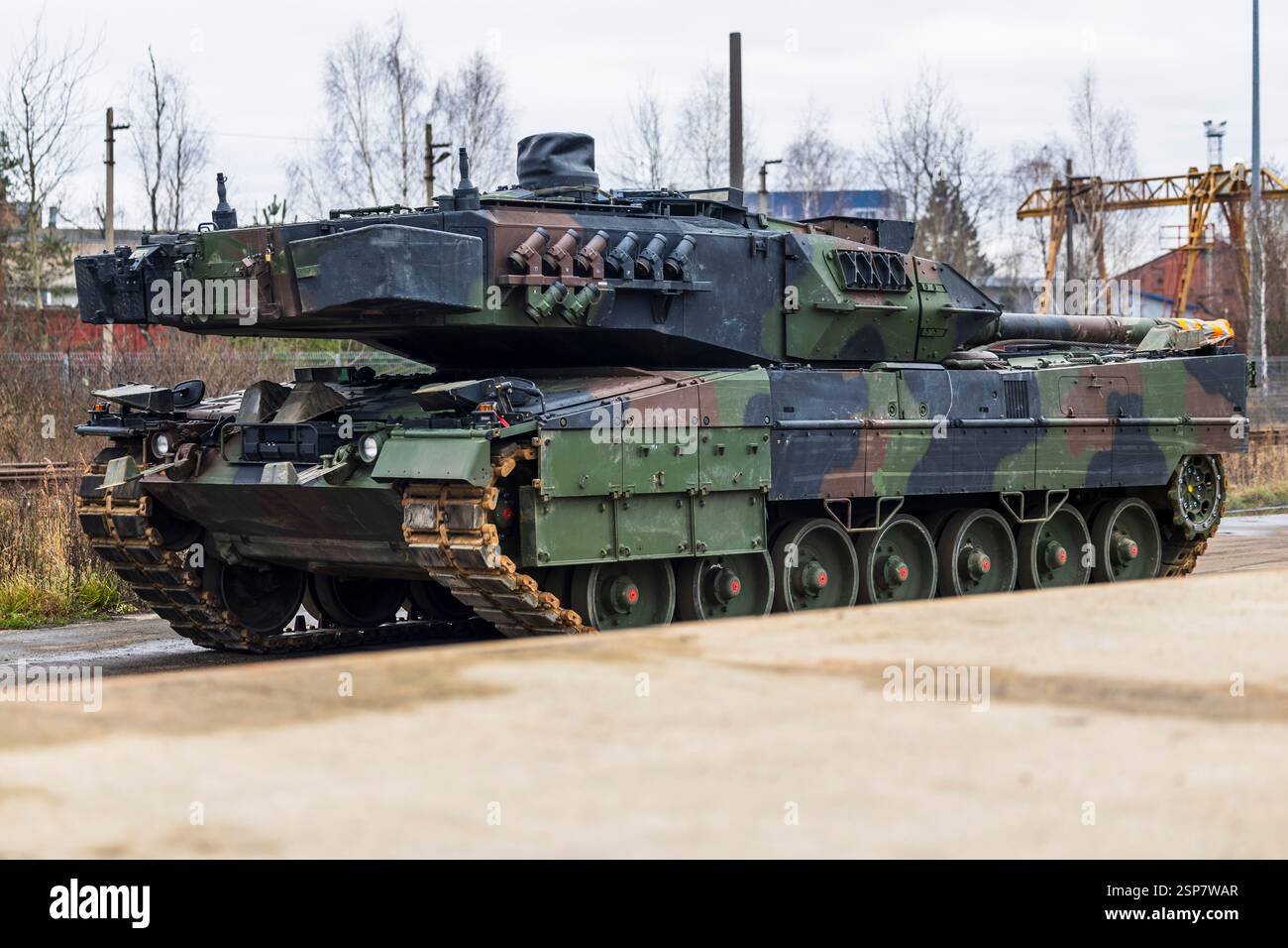 A rear view of a German Leopard 2 main battle tank loaded on a flatbed ...