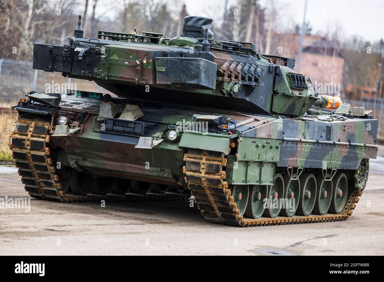 A rear view of a German Leopard 2 main battle tank loaded on a flatbed ...
