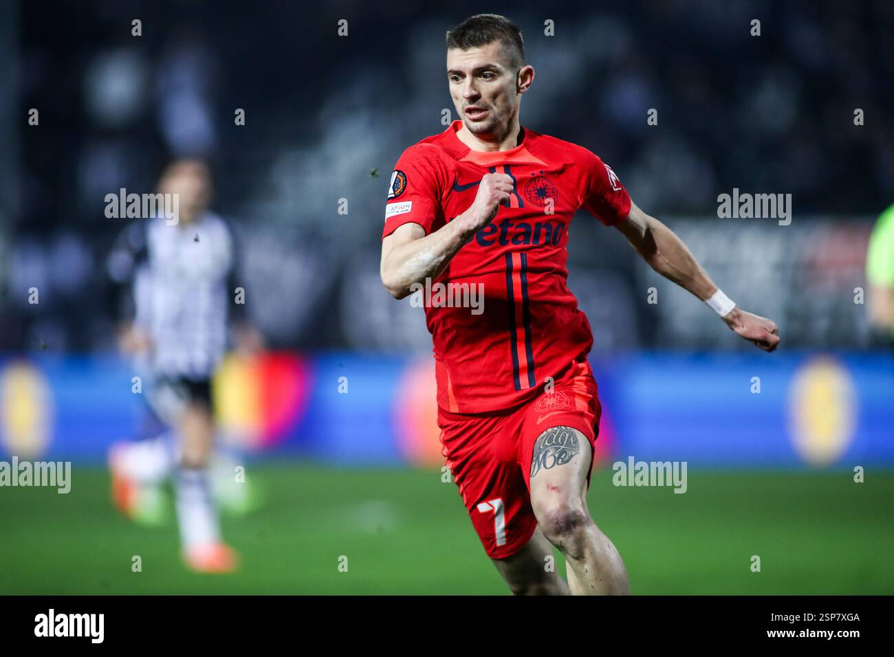 Thessaloniki, Greece. 13th Feb, 2025. Steaua's Florin Tanase in action ...