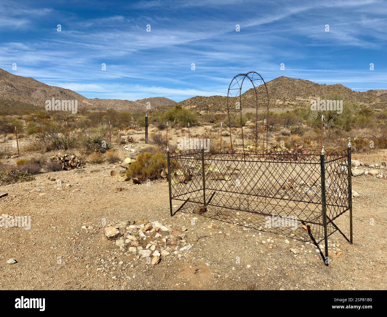 Isolated desert pioneer cemetery with a metal grave enclosure Stock ...