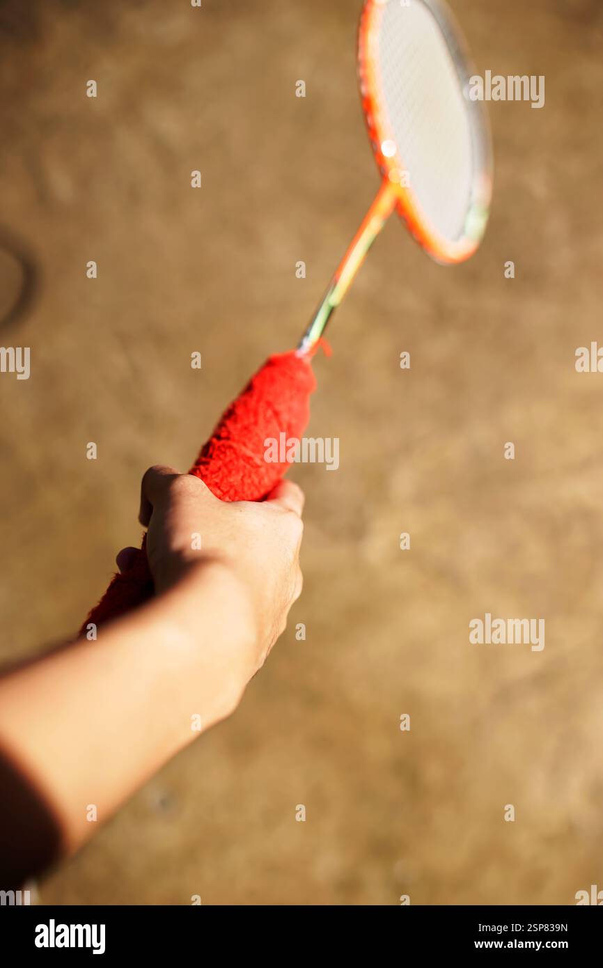 Asian badminton players hold racket Stock Photo - Alamy