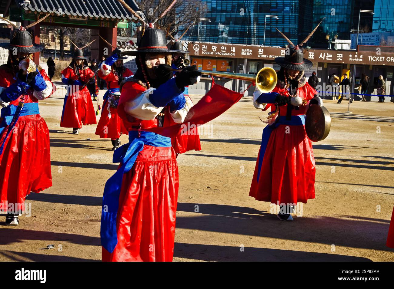 Royal guard South Korea. In vibrant red uniforms and black hats, they ...