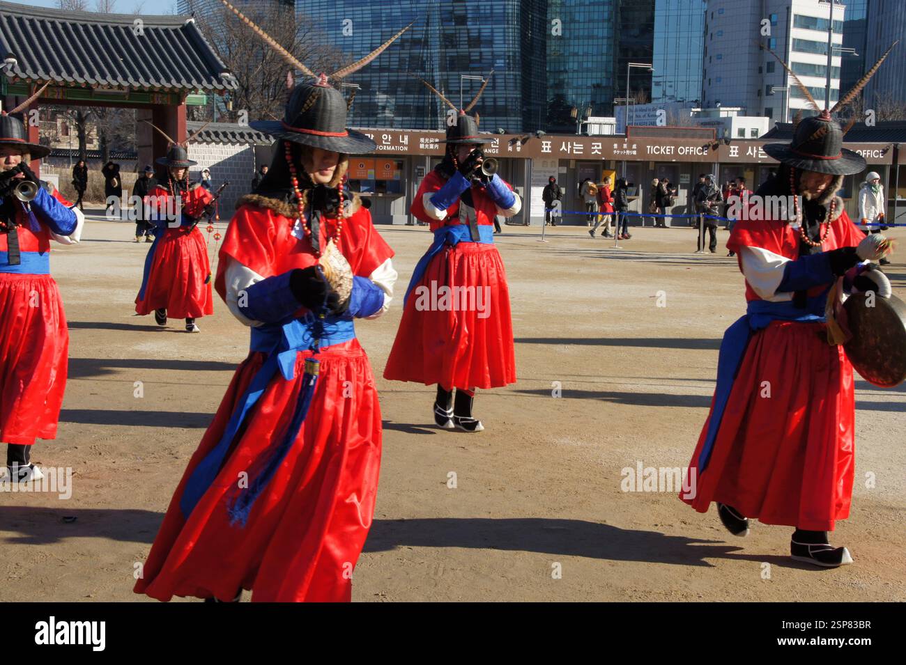 Gyeongbokgung Palace guard in traditional uniform standing on a stone ...