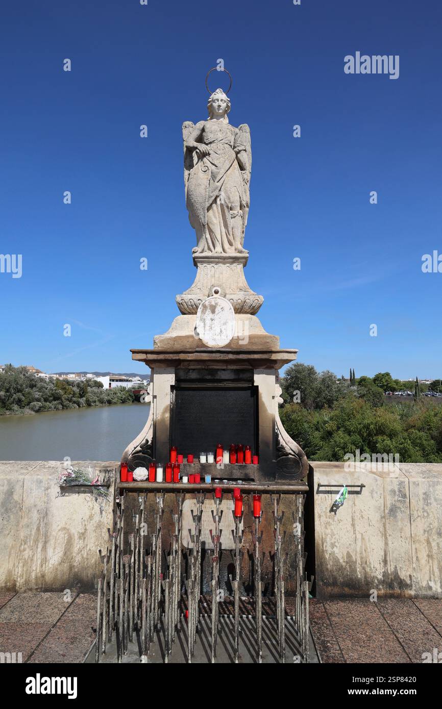 Statue of St. Archangel Raphael on the Puente Romano-Roman Bridge-in ...