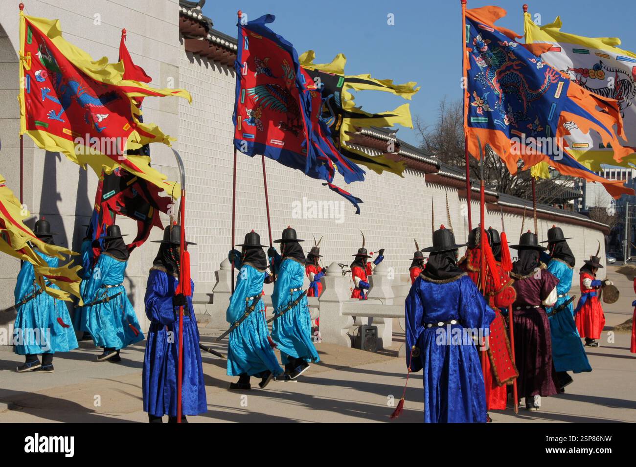Royal Guard in colorful uniforms marching in a ceremony. The guards ...