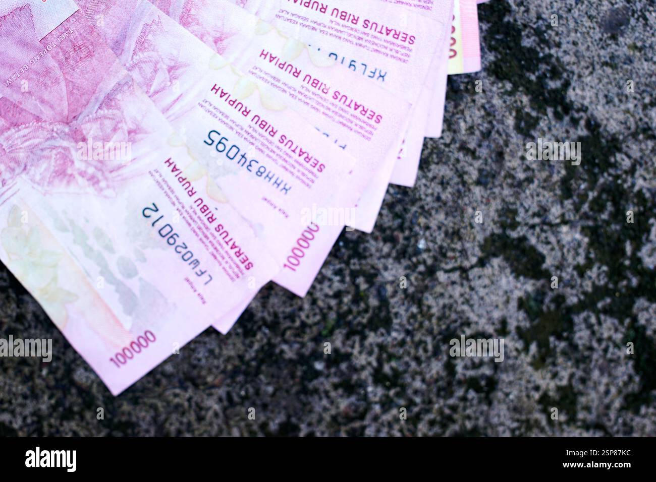 Indonesian money is neatly lined up with various denominations Stock ...