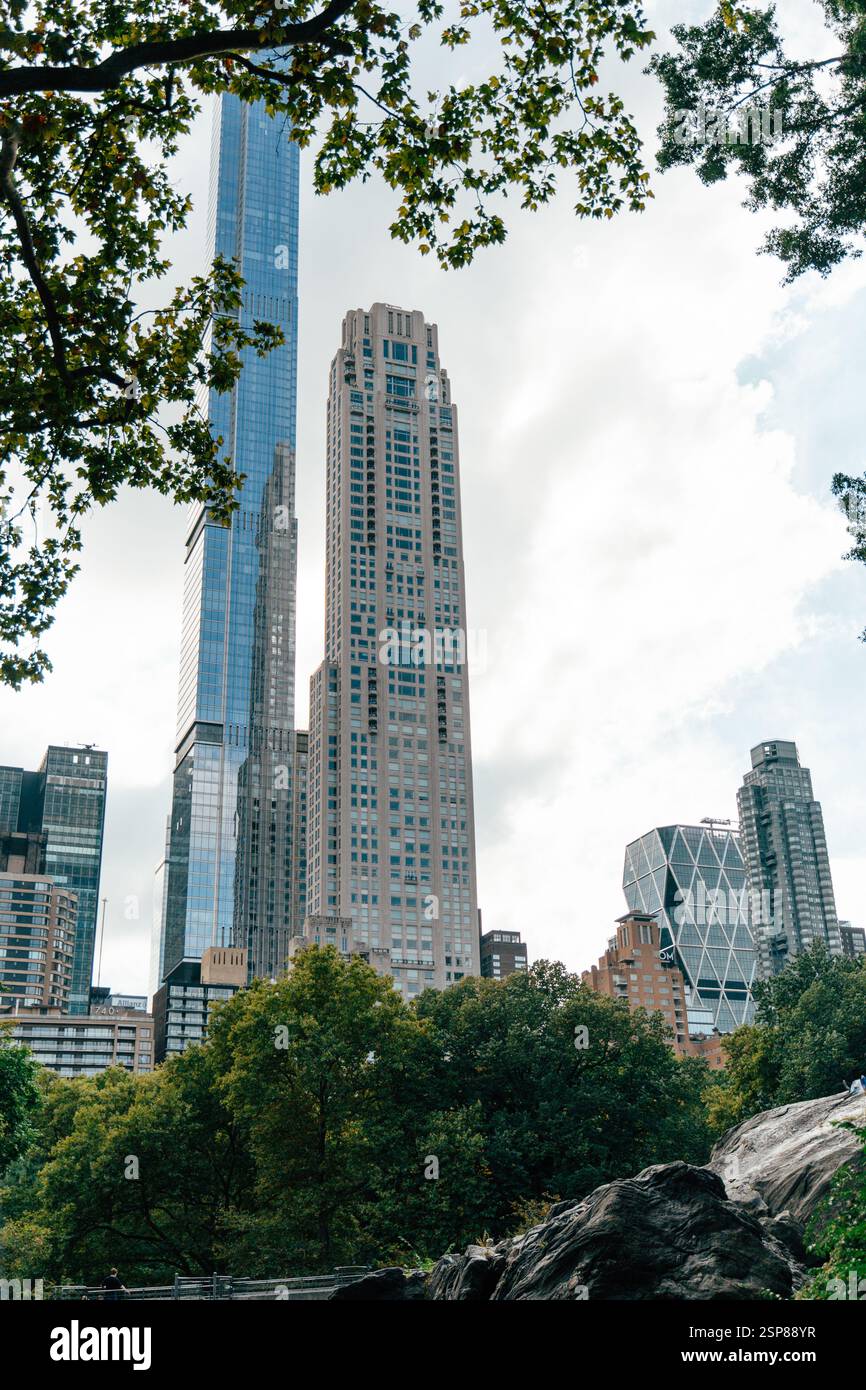 Skyscrapers landscape in New York City during autumn with green Stock ...