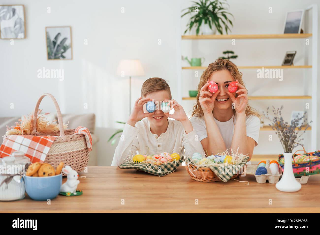 Happy mother and son celebrating Easter holidays together Stock Photo ...