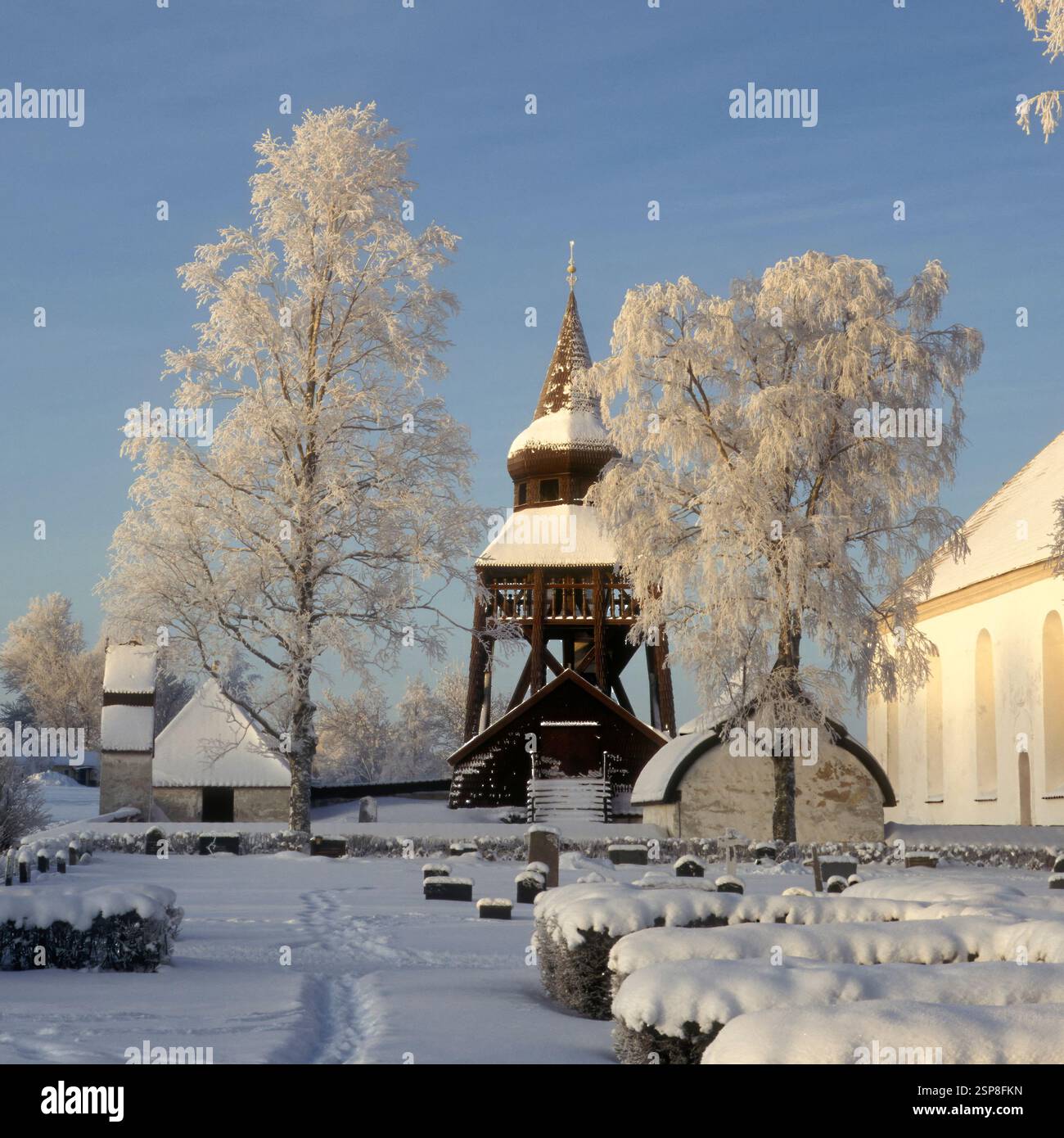Oviken Old Church after snowfall during a midwinter day. Bright ...