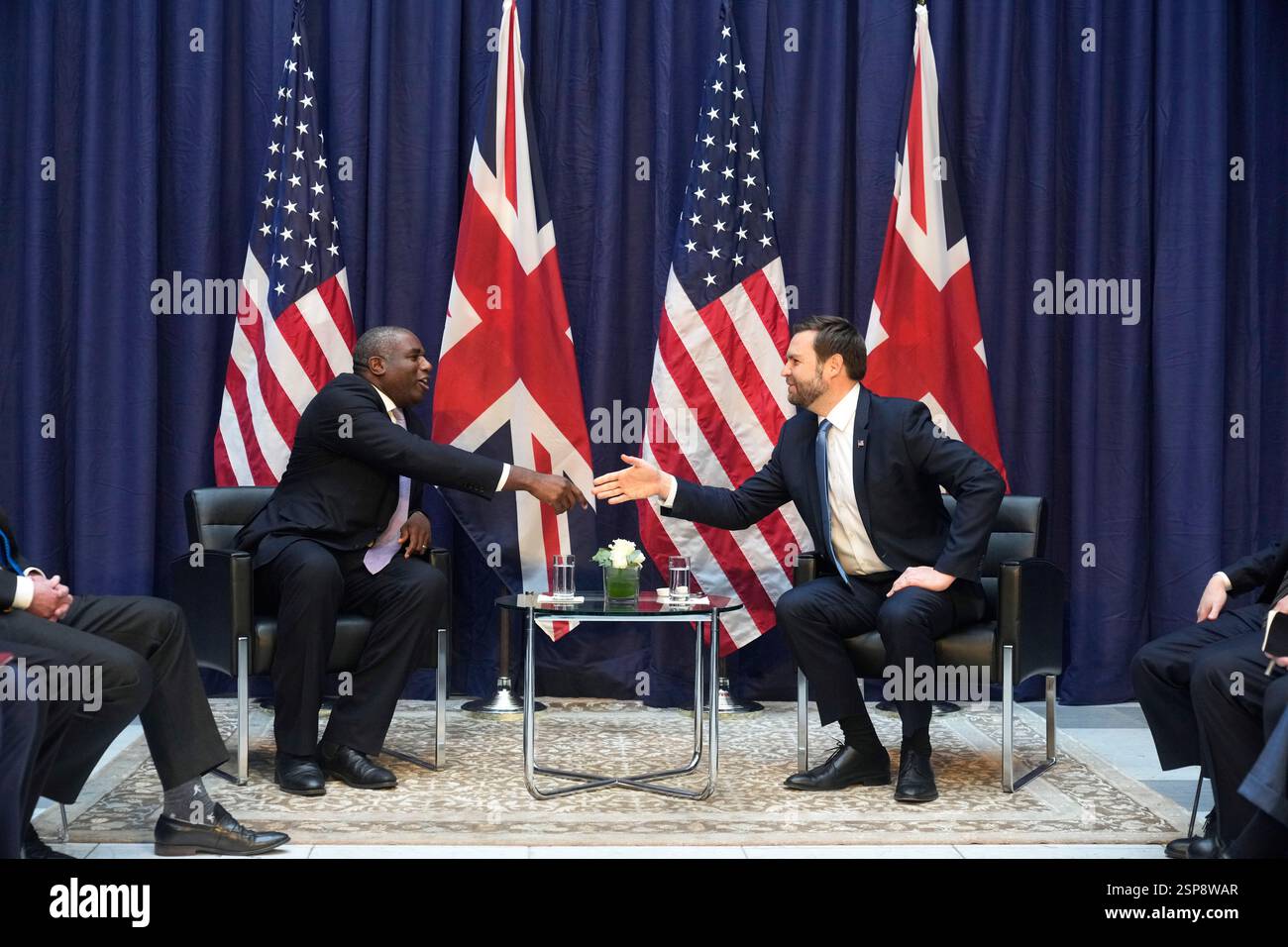 United States Vice-President JD Vance, right, and Britain's Foreign ...
