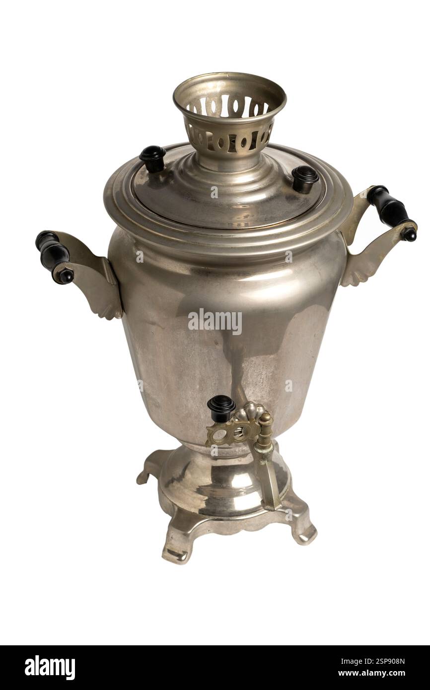 Old metal samovar isolated on white background Stock Photo - Alamy
