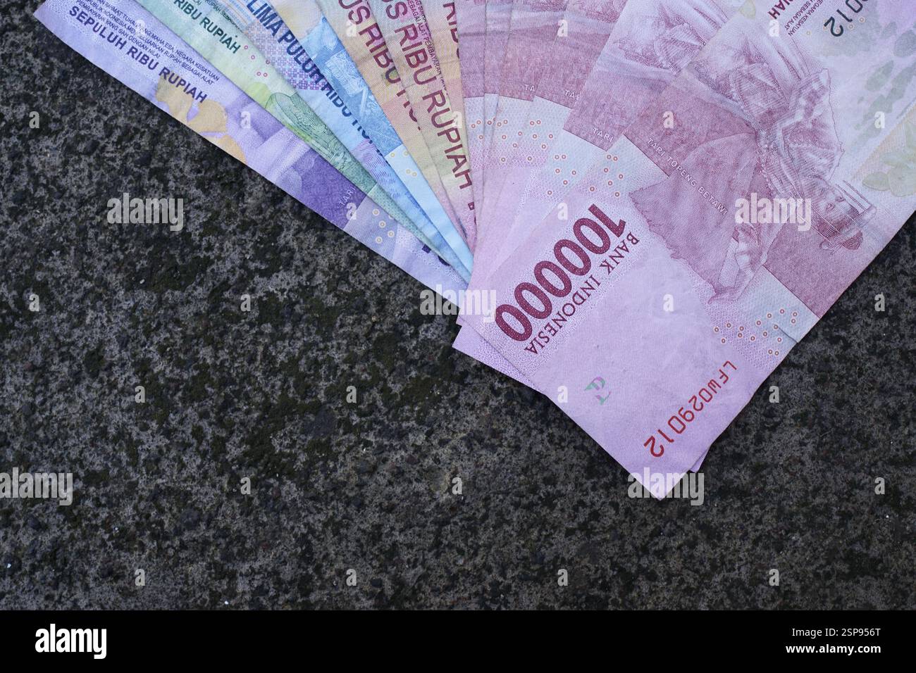 colorful Indonesian money neatly lined up various fractions Stock Photo ...