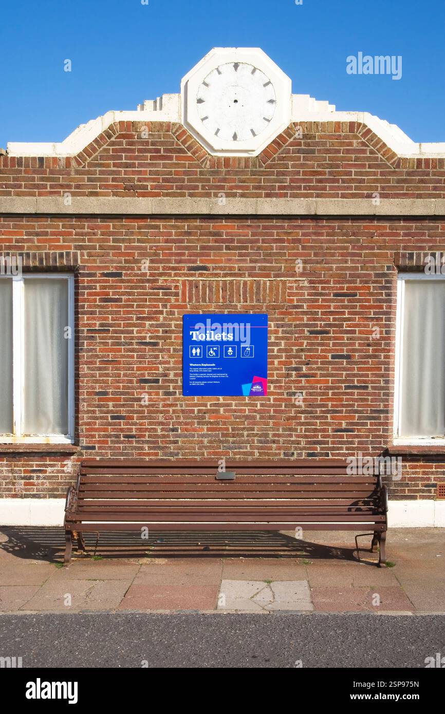 public toilets sign at hove on the east sussex coast Stock Photo - Alamy