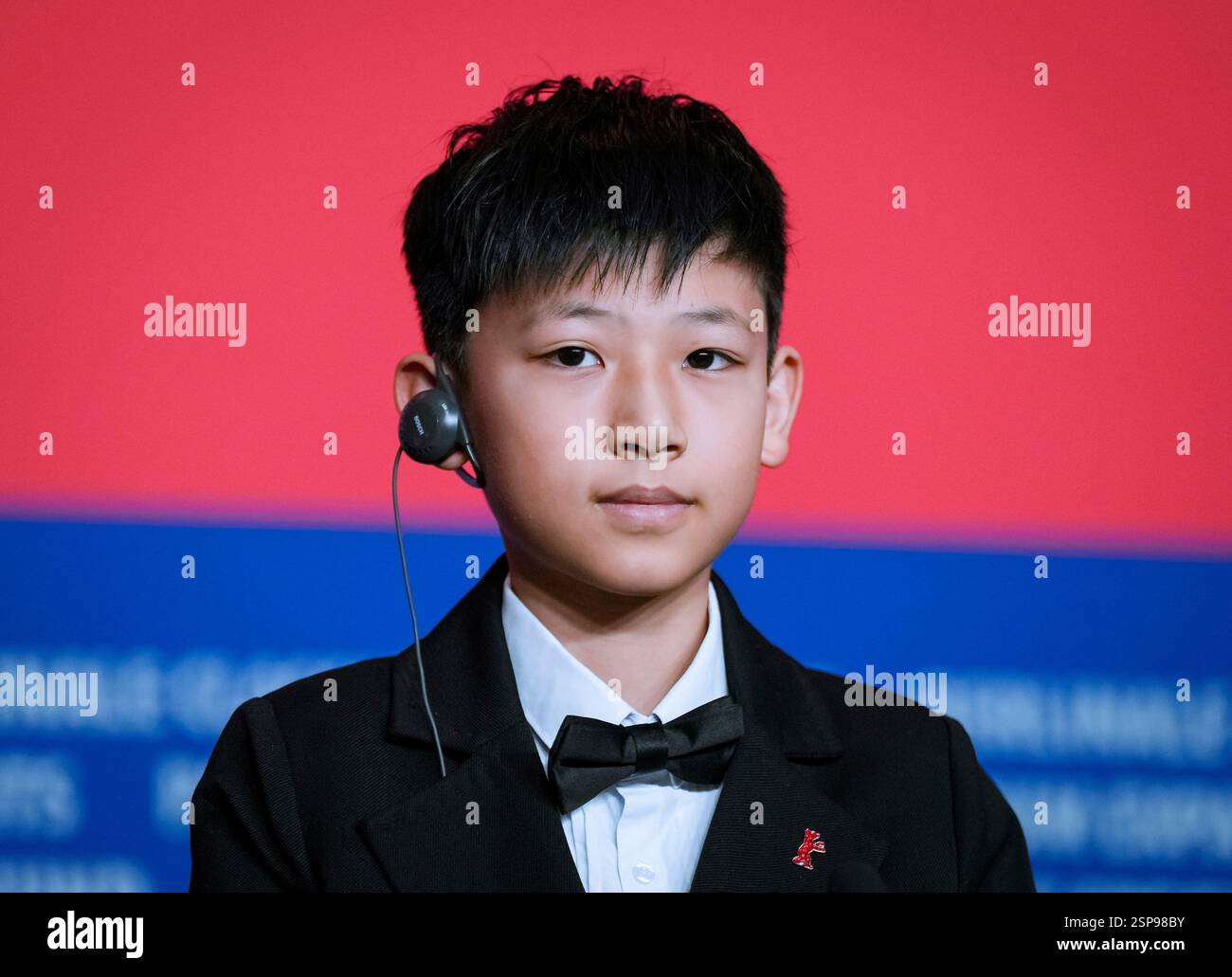 14 February 2025, Berlin: Actor Wang Shang waits for the start of the ...