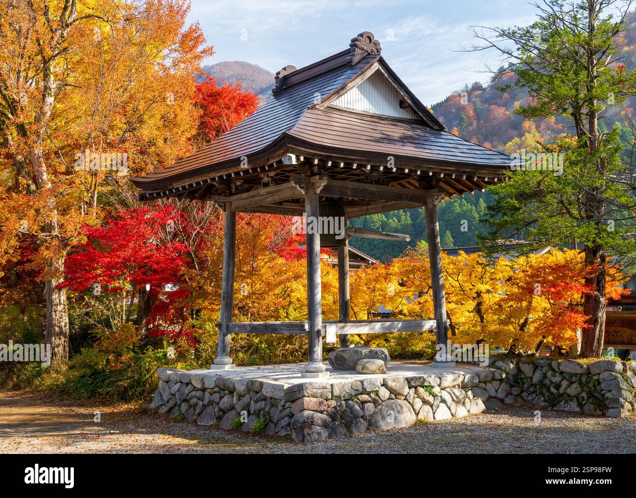 Temple Bell Tower and Autumn Leaves in Shirakawa-go, Japan Stock Photo ...