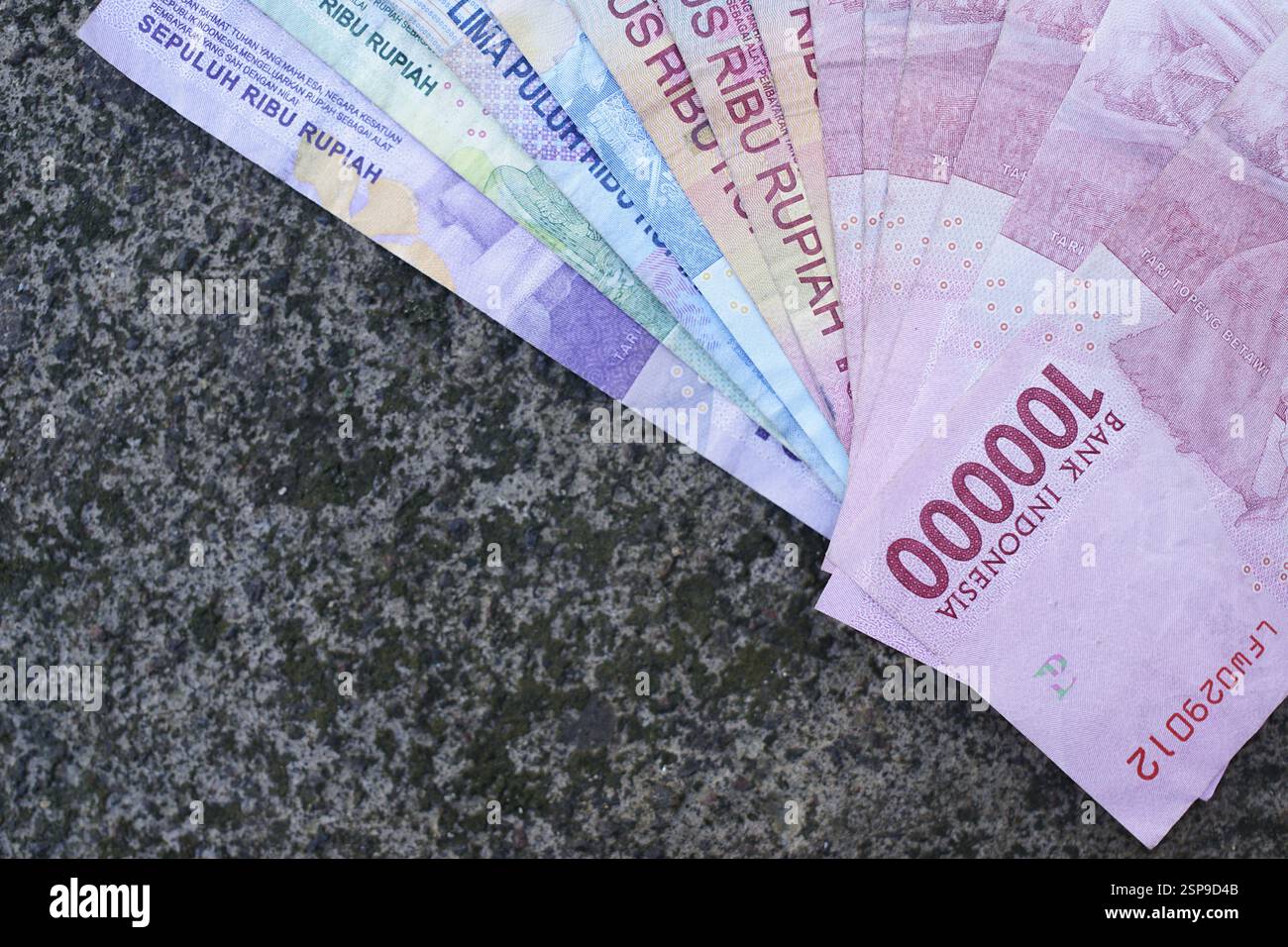 colorful Indonesian money neatly lined up various fractions Stock Photo ...