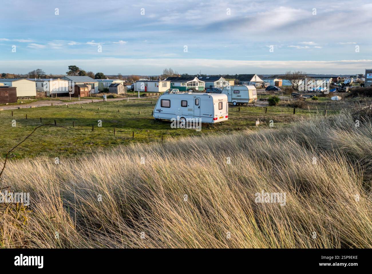Caravans and holiday homes behind the beach at Snettisham in Norfolk ...