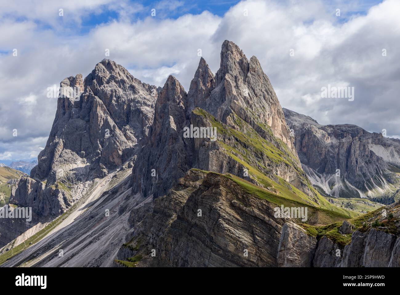 Sunlight casts striking contrasts across the jagged Seceda peaks in the ...
