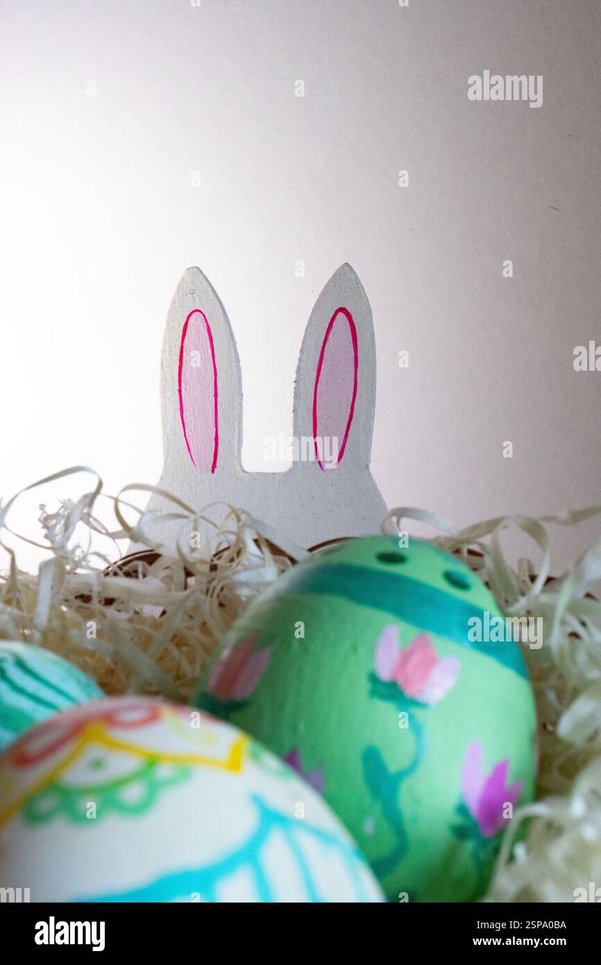 Easter eggs , flowers and funny bunny to celebrate Easter. space for ...