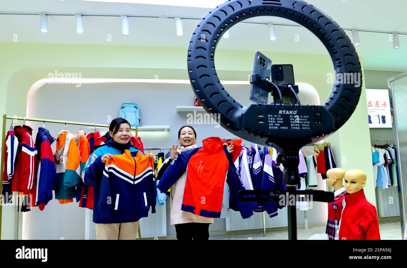 ZHANGYE, CHINA - FEBRUARY 14, 2025 - The staff introduces the new ...