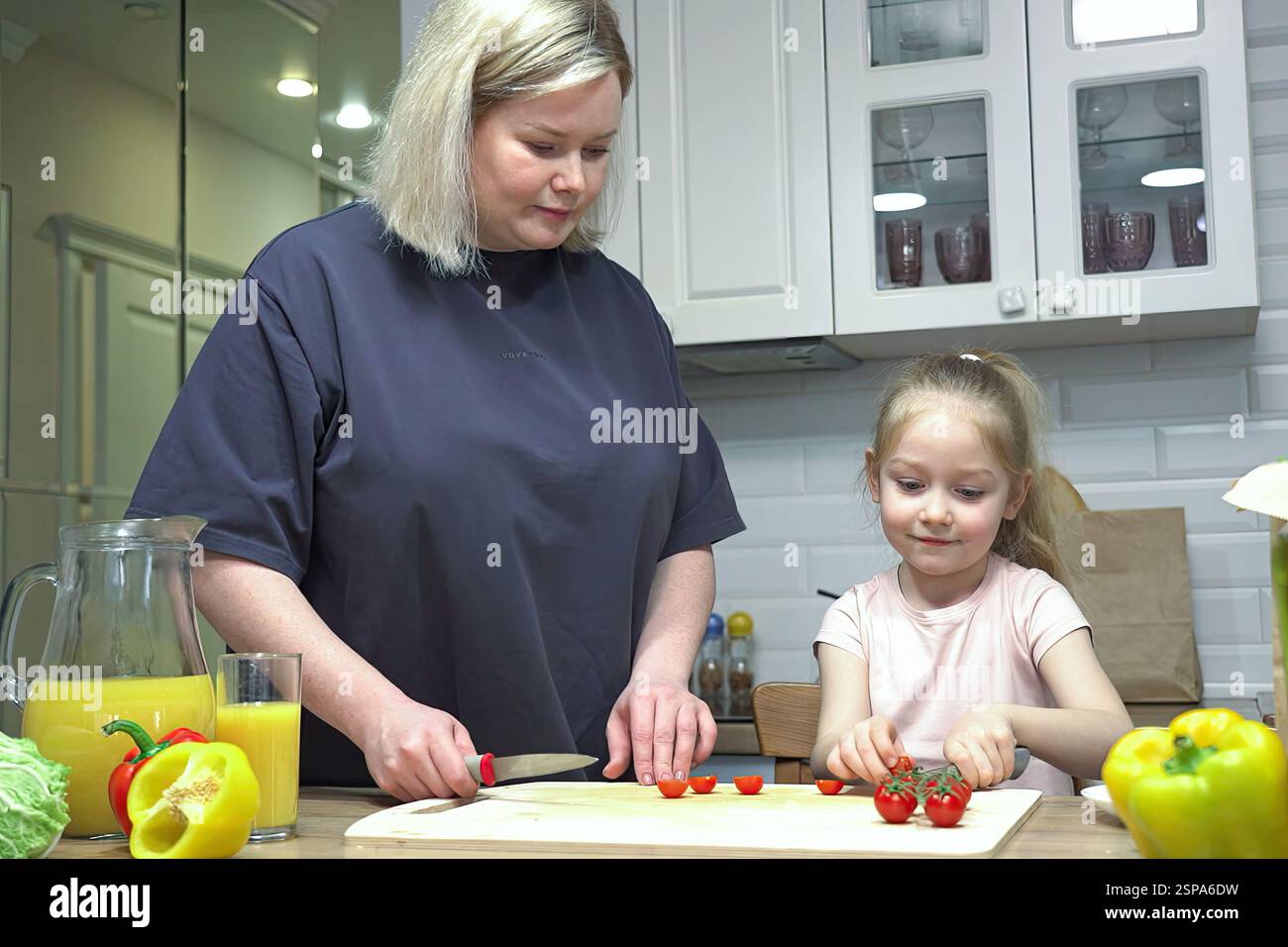Fun family cooking Stock Photo - Alamy