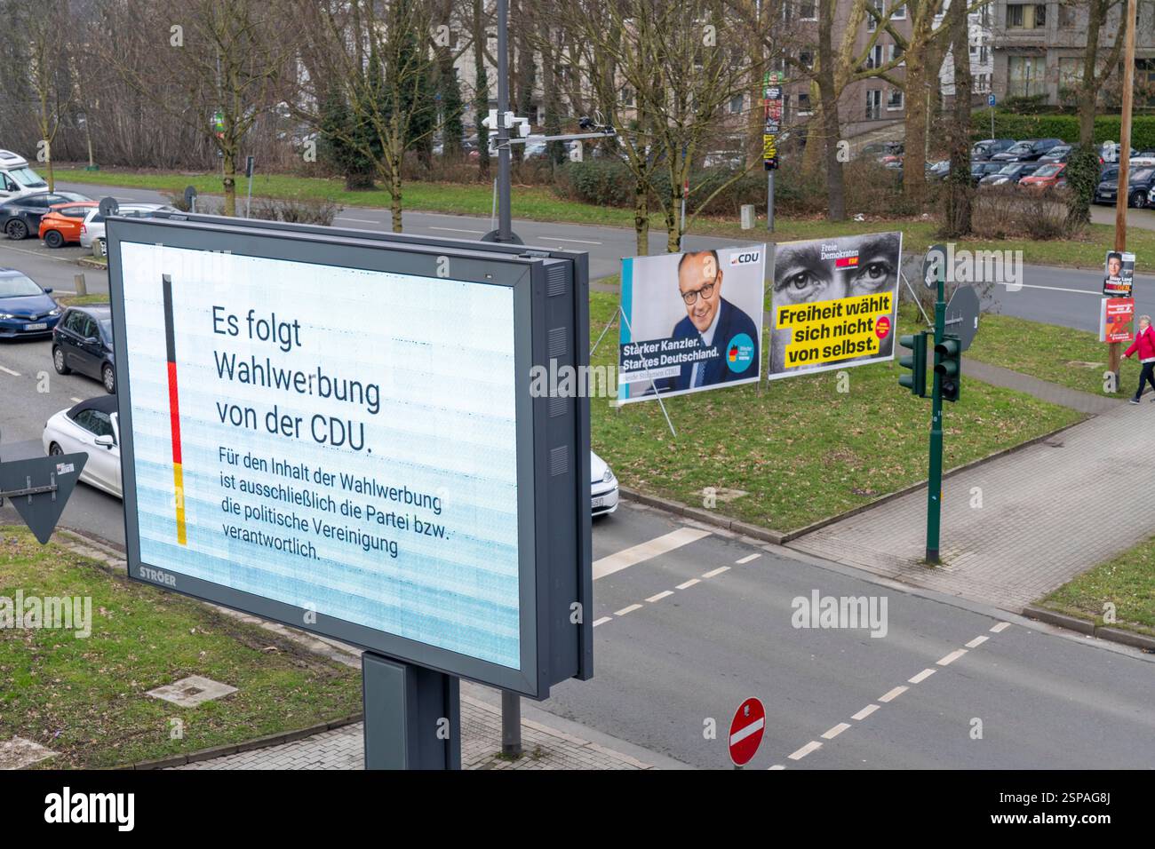Digital billboard with CDU election advertising, behind it analogue ...