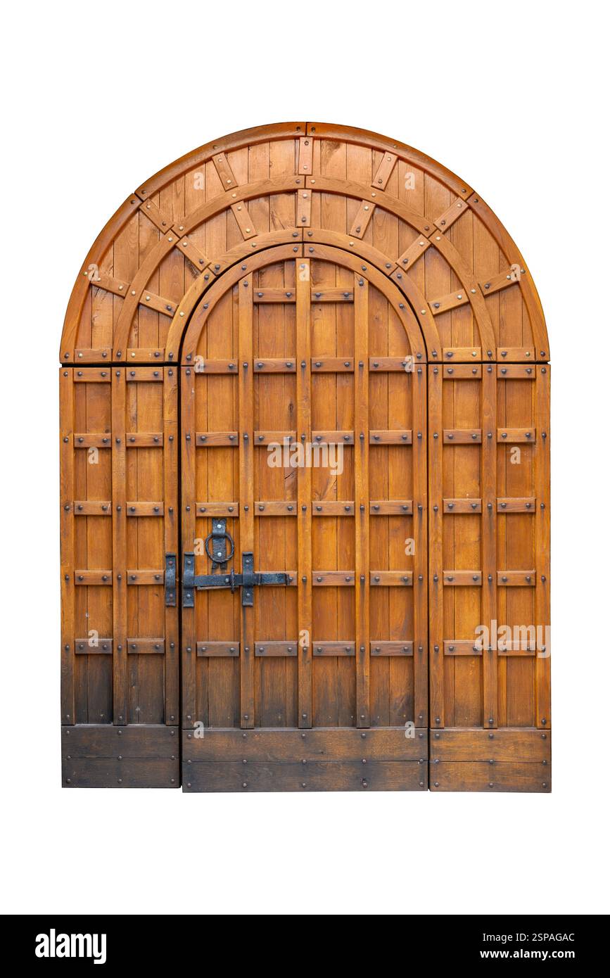 Massive wooden doors with arched top, reinforced with horizontal and ...