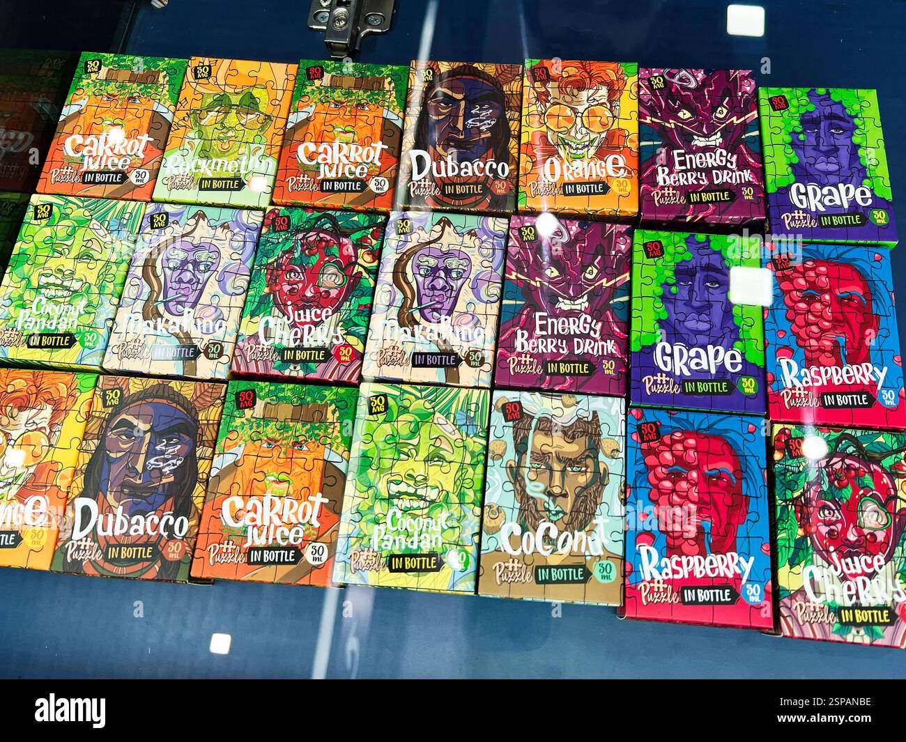 Lviv, Ukraine - February 13, 2025: Vibrant smoke vape boxes featuring ...