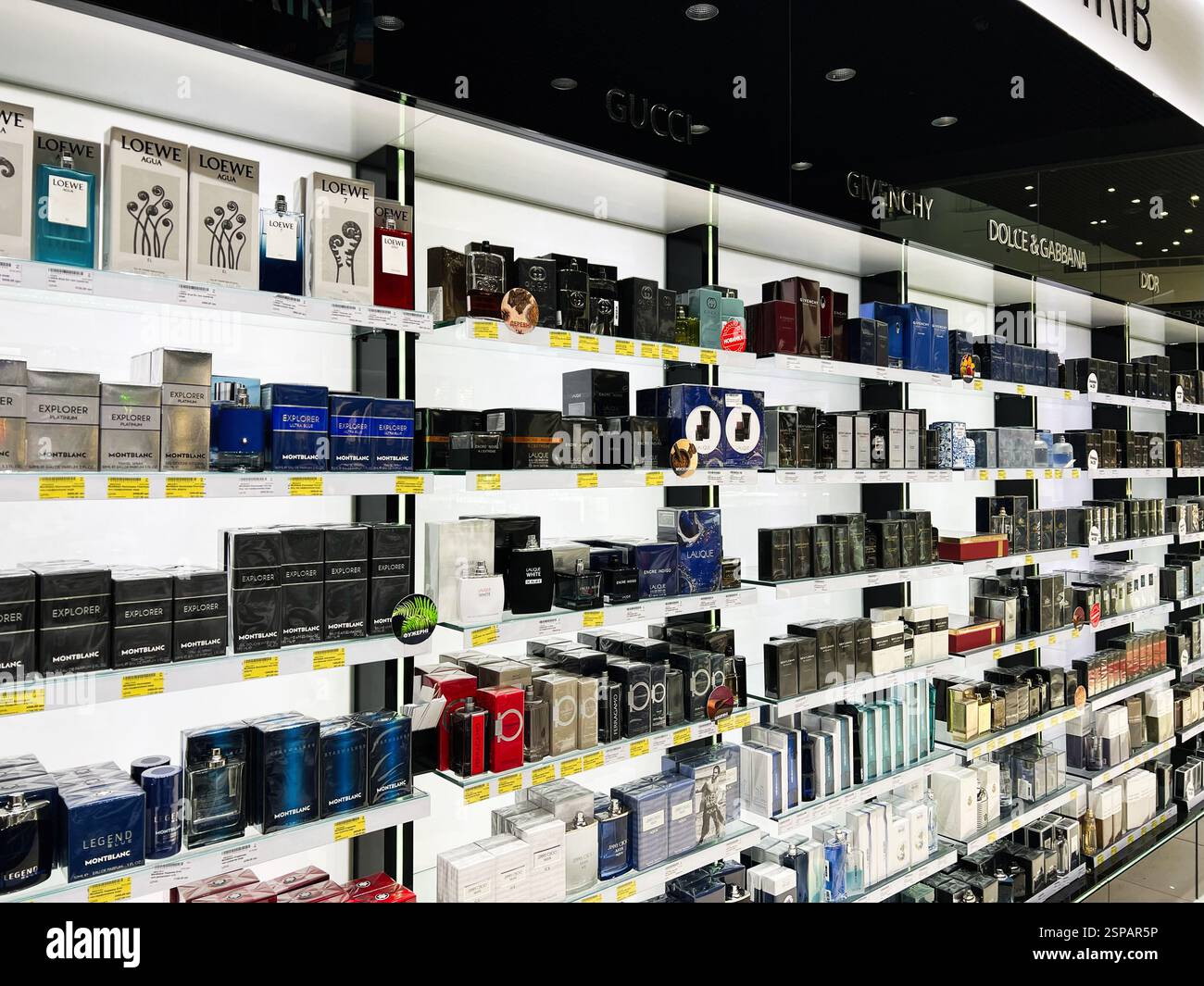 Lviv, Ukraine - February 13, 2025: A illuminated shelf showing luxury ...