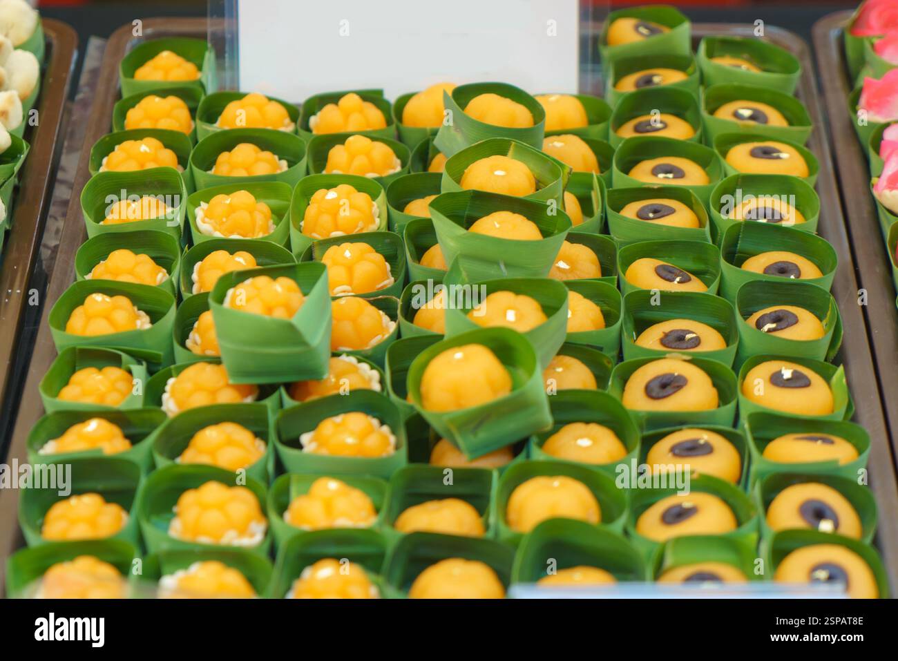close-up shot of traditional Thai golden sweets made from egg yolks and ...