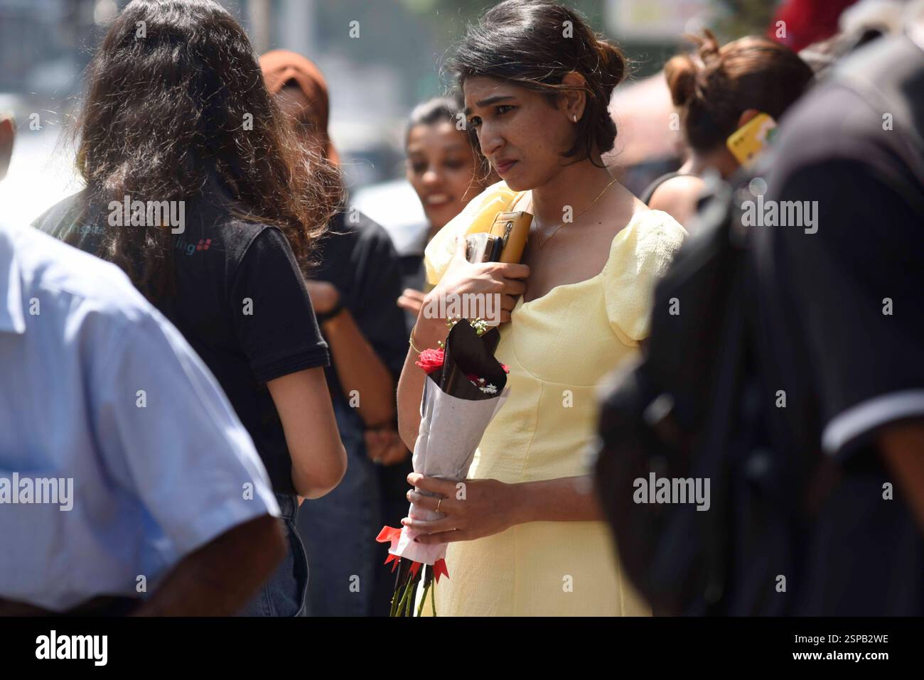 Valentine s day in Sri Lanka A woman holds red roses on Valentine s day ...