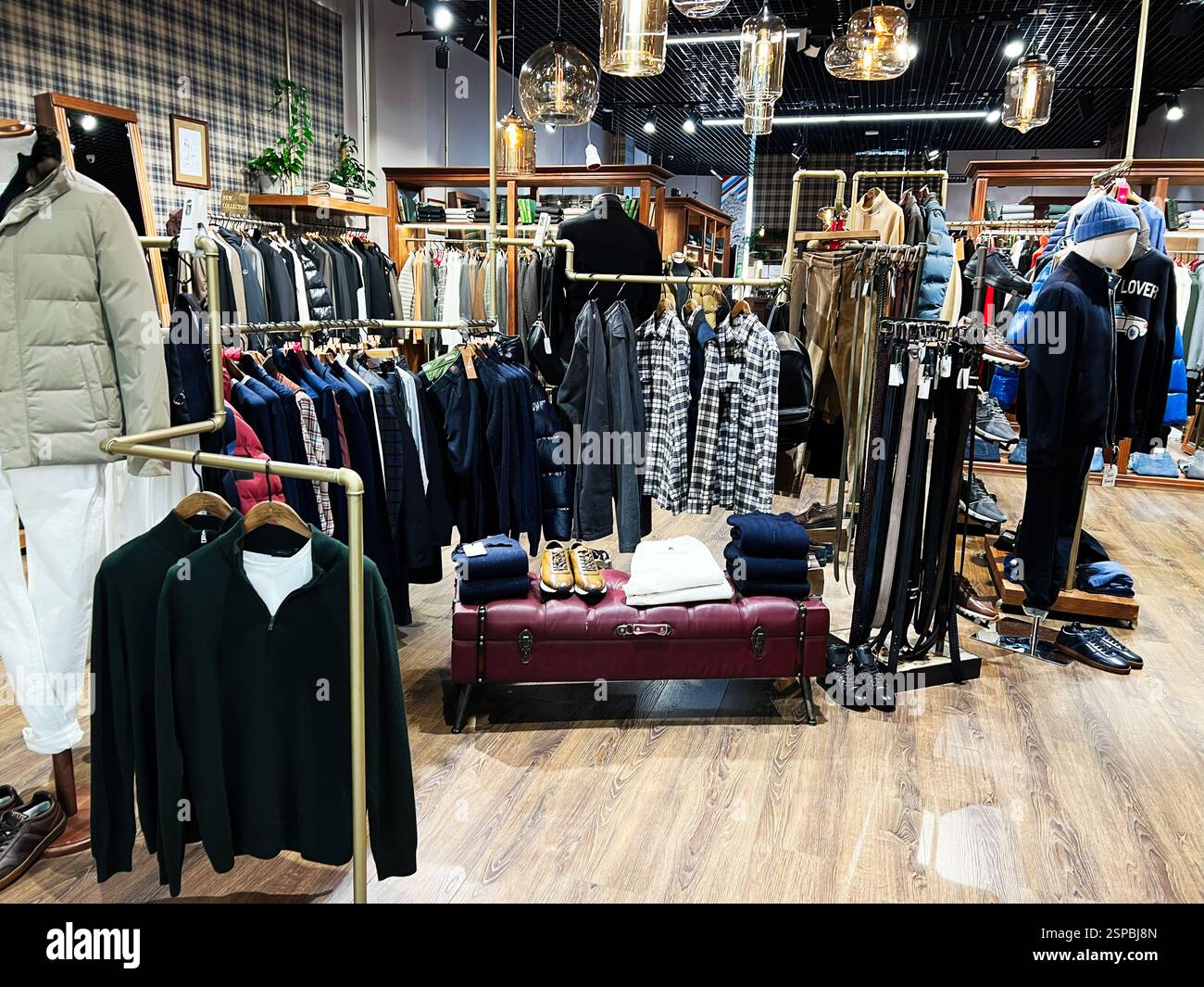 Lviv, Ukraine - February 13, 2025: Clothing store interior with stylish ...
