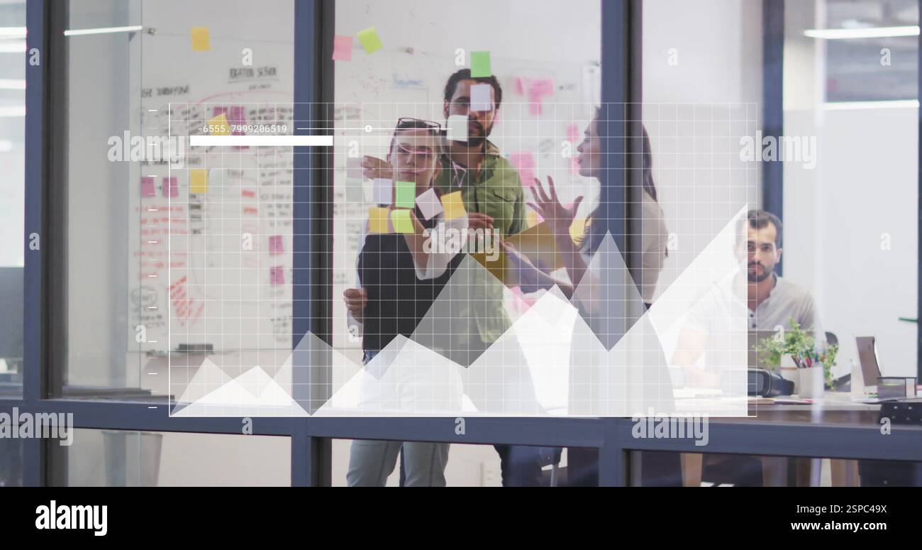 Image of diagram over diverse colleagues taking notes in office Stock ...