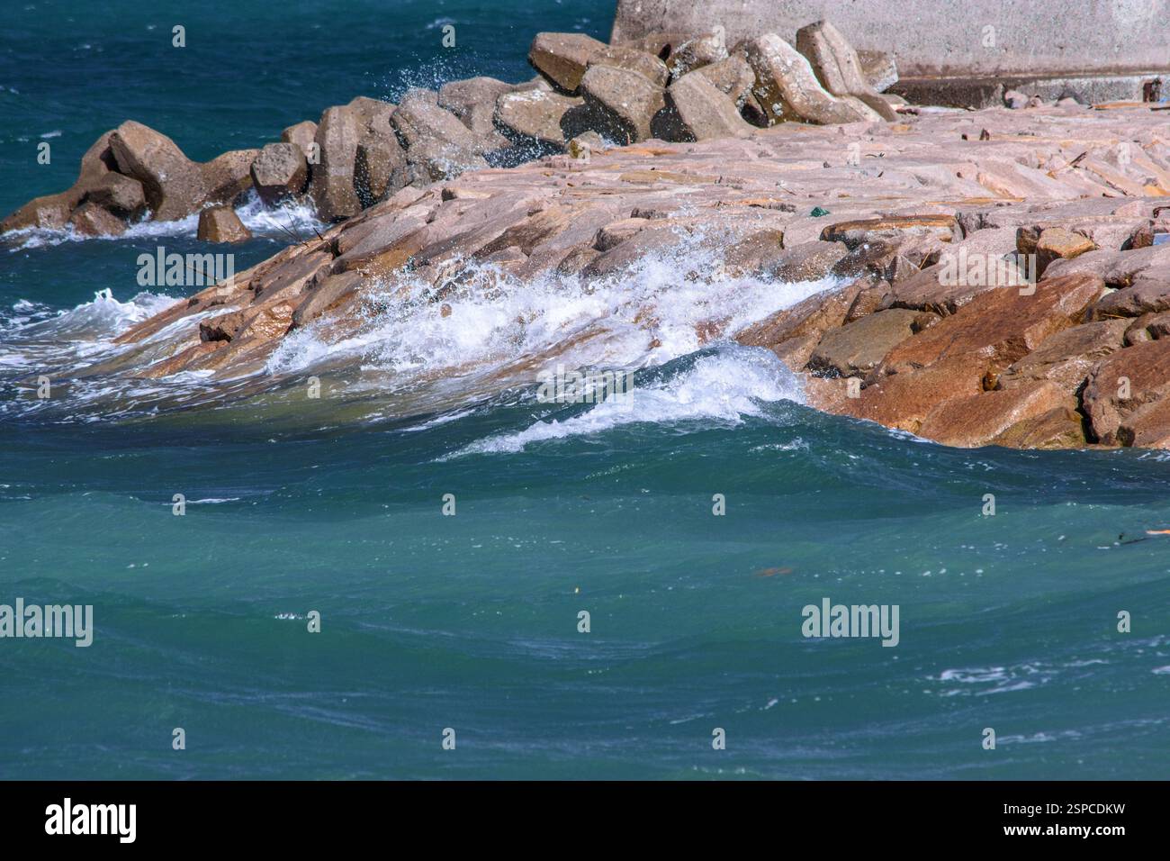 Protective concrete tetrapod blocks in the Osaka Bay, protecting the shoreline from high waves ...