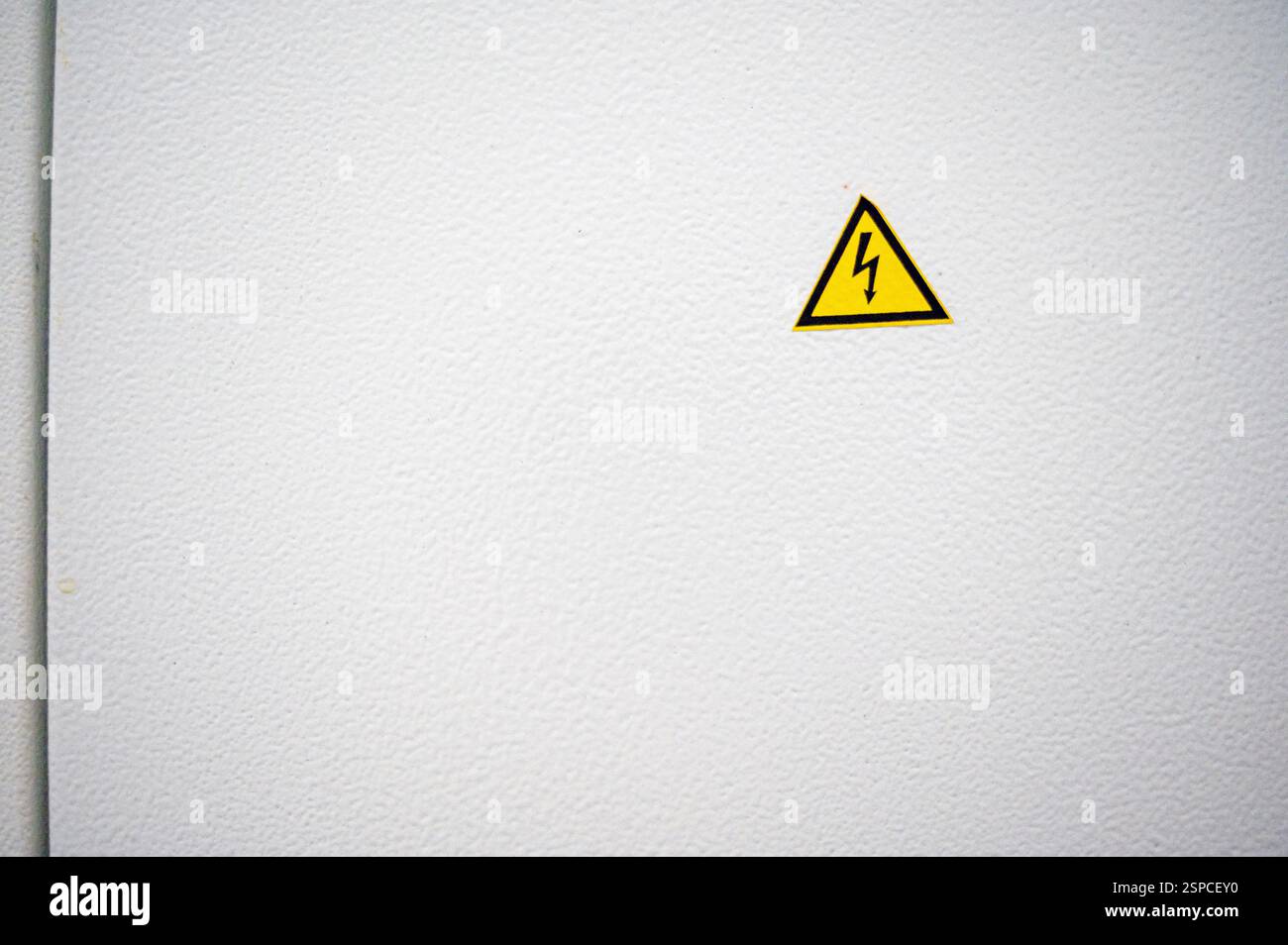 Warning sign about high voltage on electrical equipment . A sign above ...