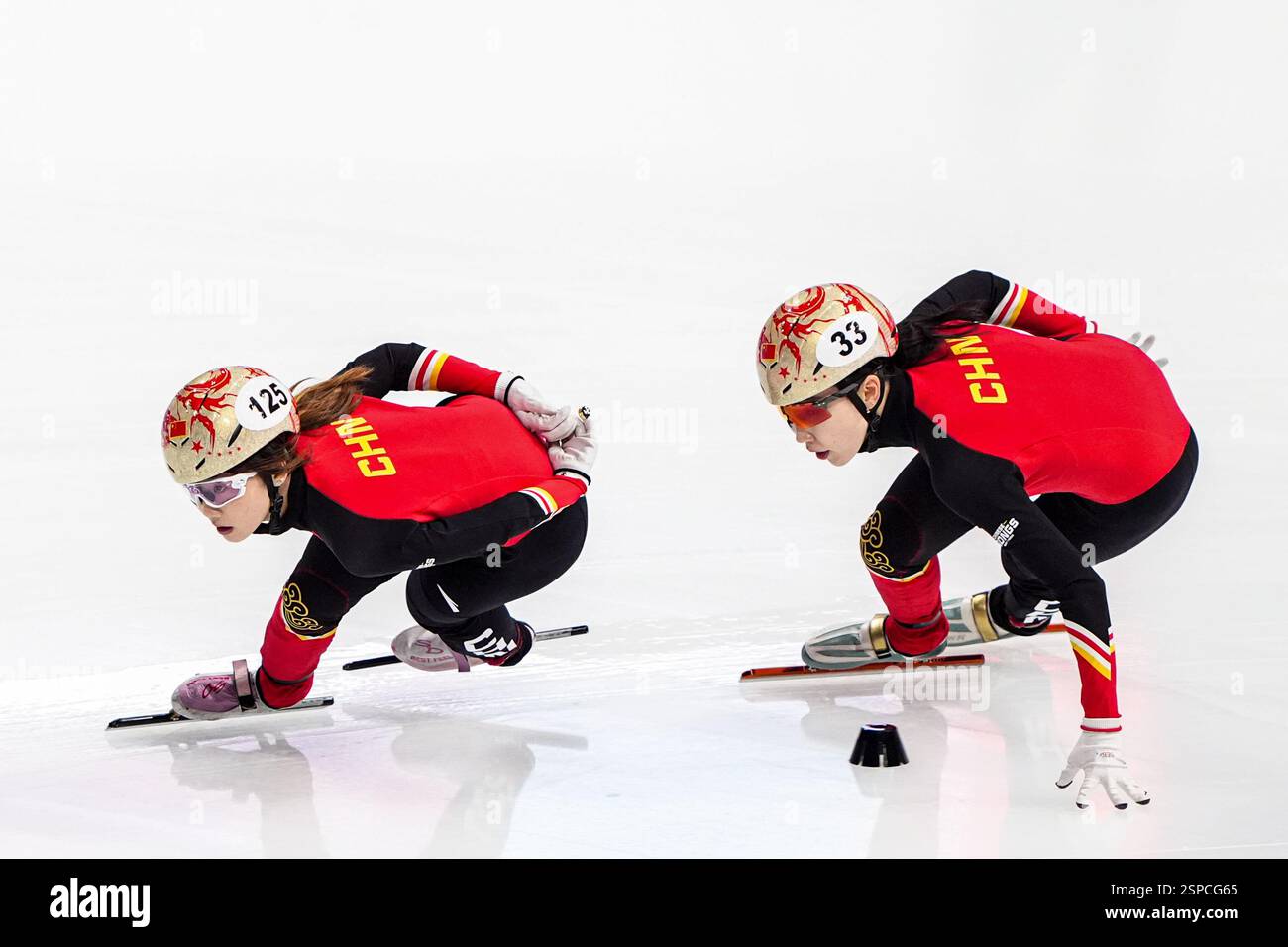 MILAN, ITALY - FEBRUARY 14: Jingru Yang of China, Yize Zang of China during the ISU World Tour ...