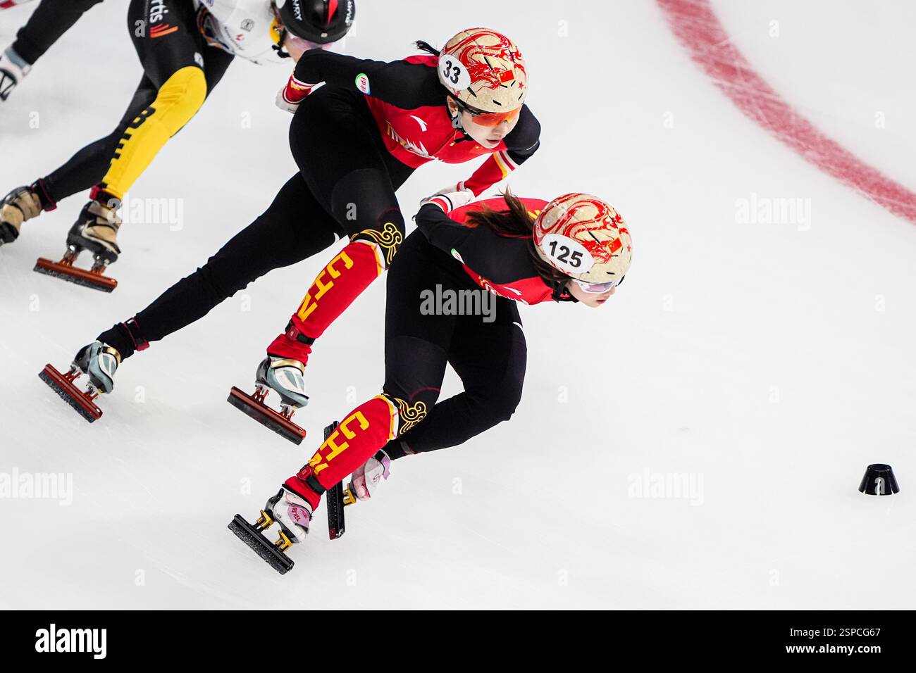 MILAN, ITALY - FEBRUARY 14: Jingru Yang of China, Yize Zang of China ...