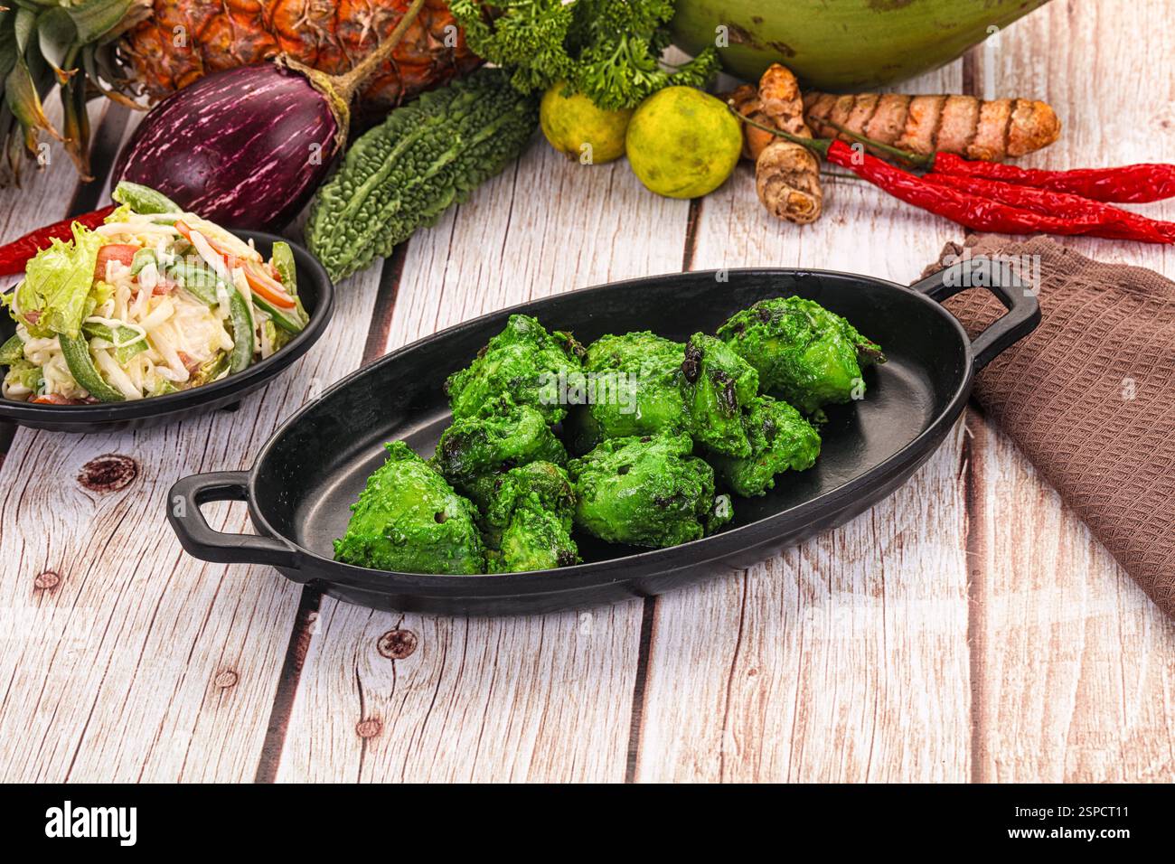 Indian green chicken mint tikka barbecue Stock Photo - Alamy