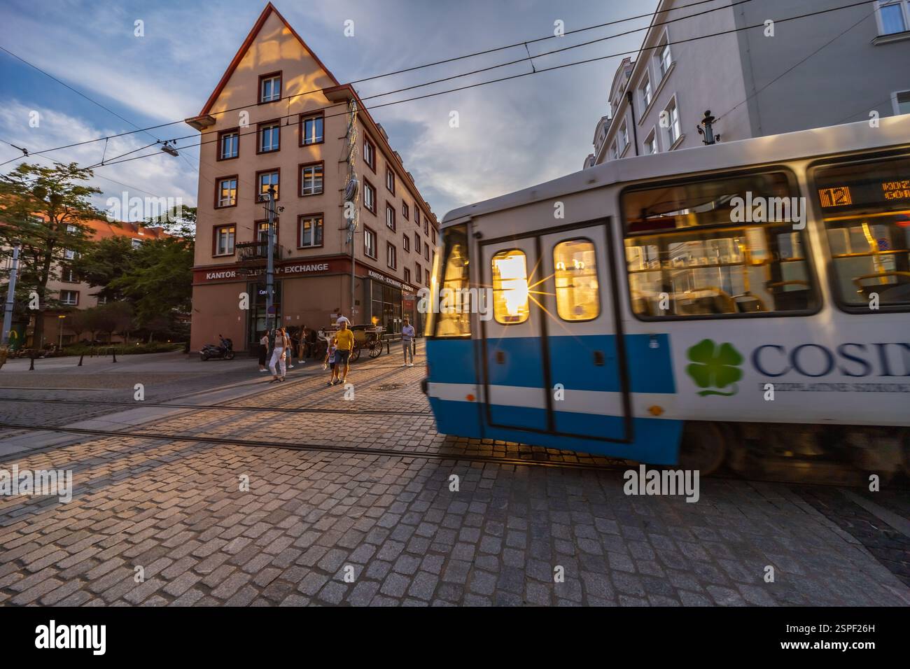 Wroclaw, Poland - July 31 2024: Modern Blue Electric Tram Moving Along ...