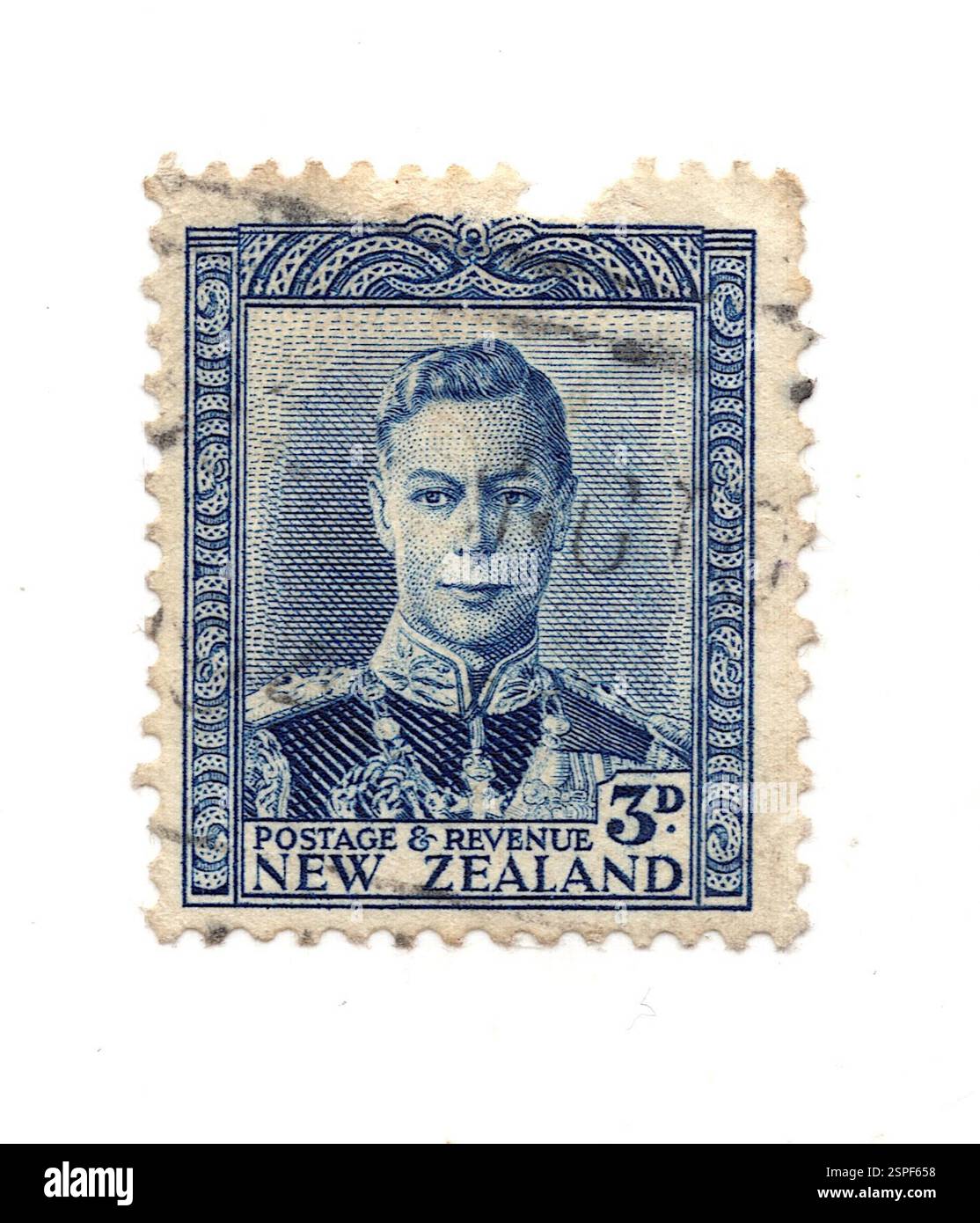 A vintage King George VI postage stamp from New Zealand isolated on a ...