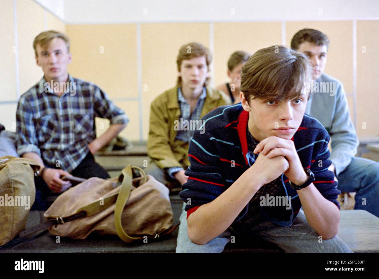 Young Russian men wait for their physical exams at the local Army ...
