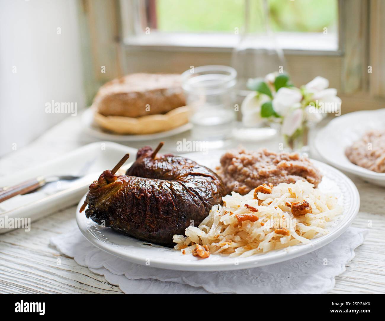 Bloody sausage morcilla, stewed sour turnip and mashed potato with ...