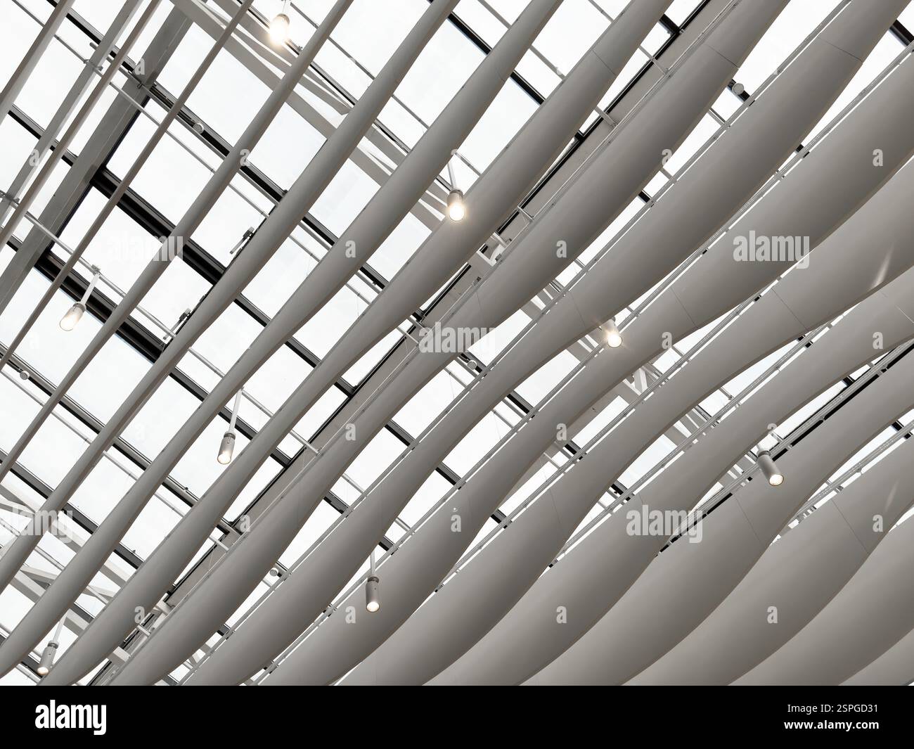 Lights and ventilation system in long line on ceiling of the industrial ...