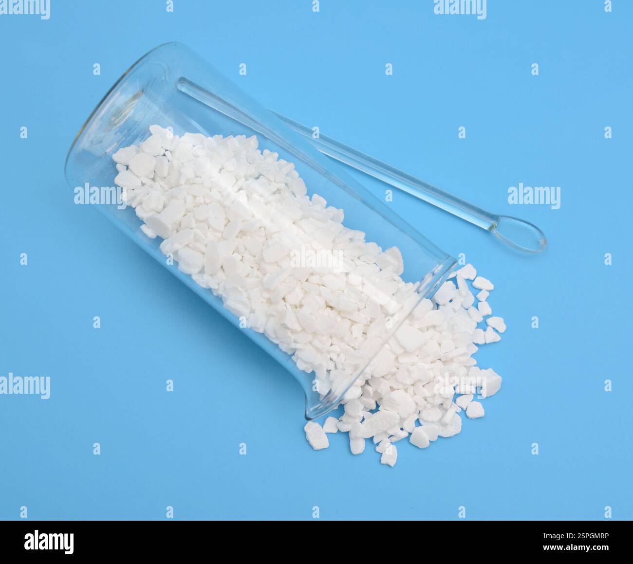 Calcium chloride on blue background Stock Photo - Alamy