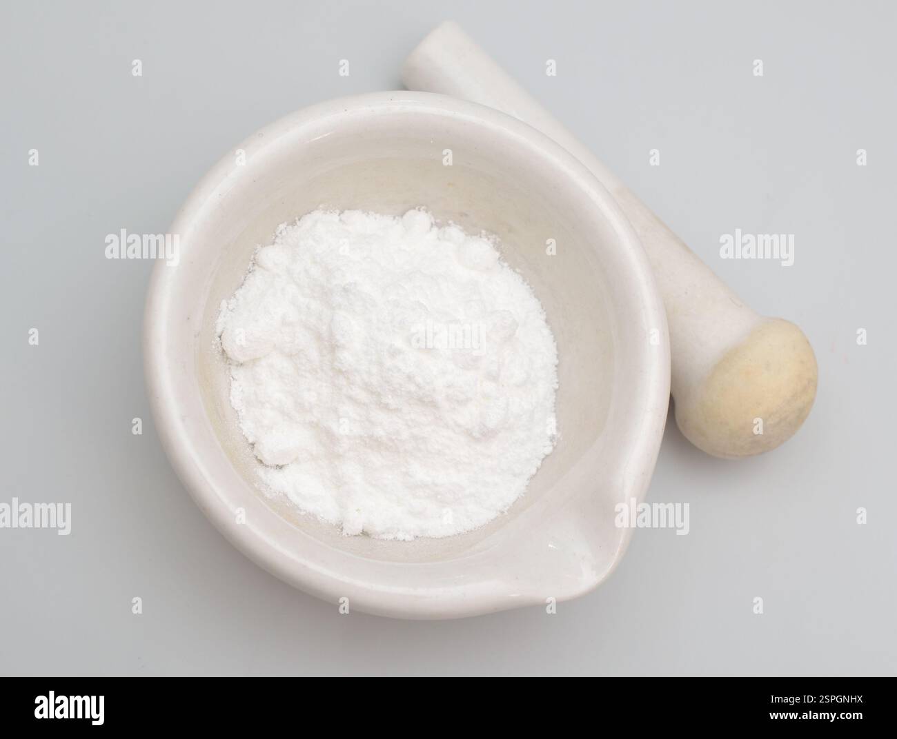 Caffeine powder on the light gray background Stock Photo - Alamy