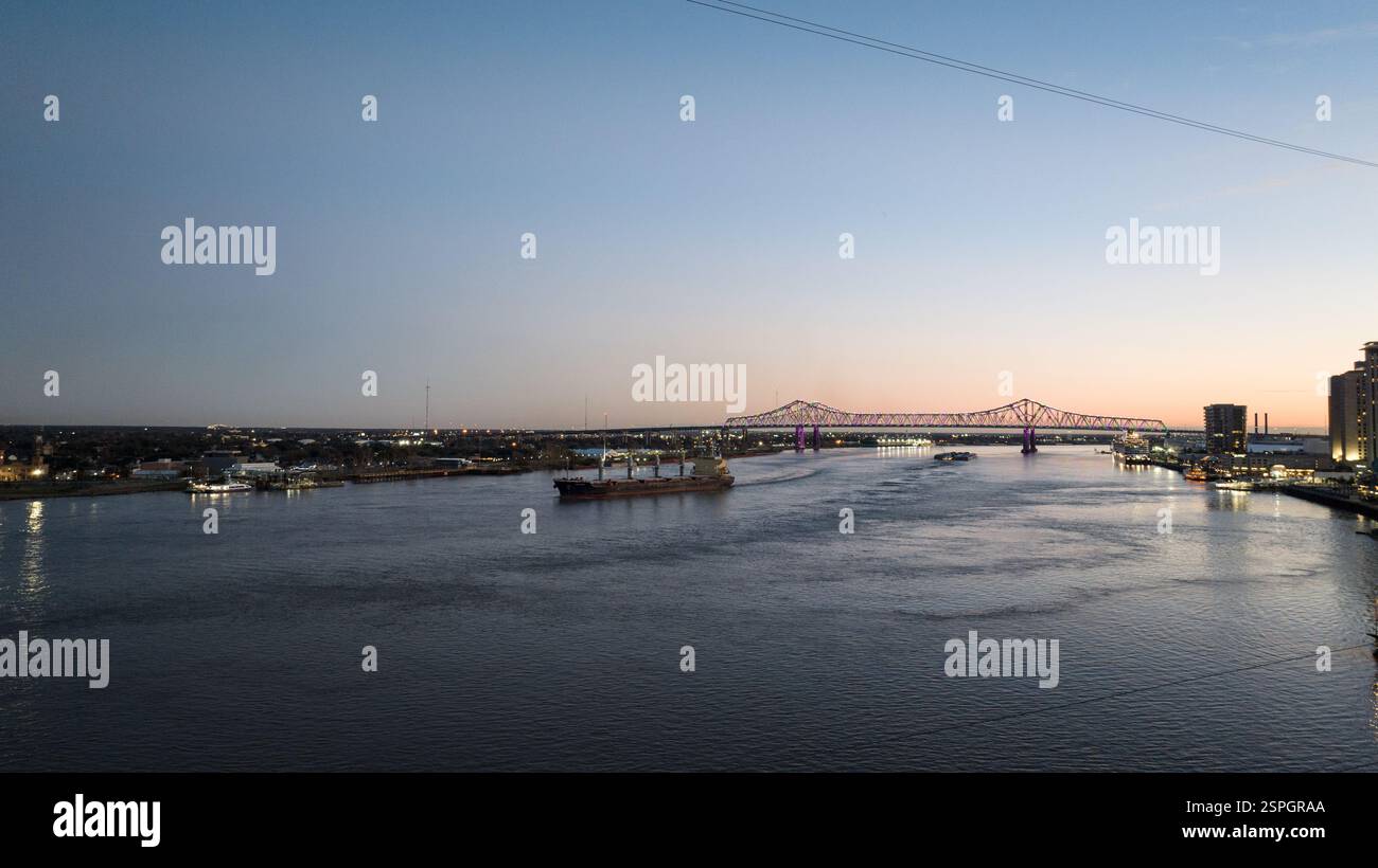 defaultDrone shot of illuminated Crescent City Connection bridge at ...