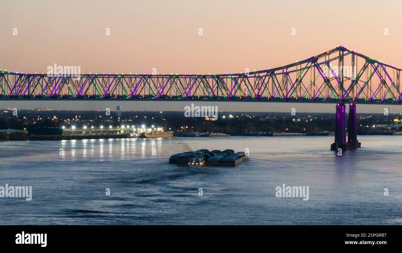 defaultDrone shot of illuminated Crescent City Connection bridge at ...