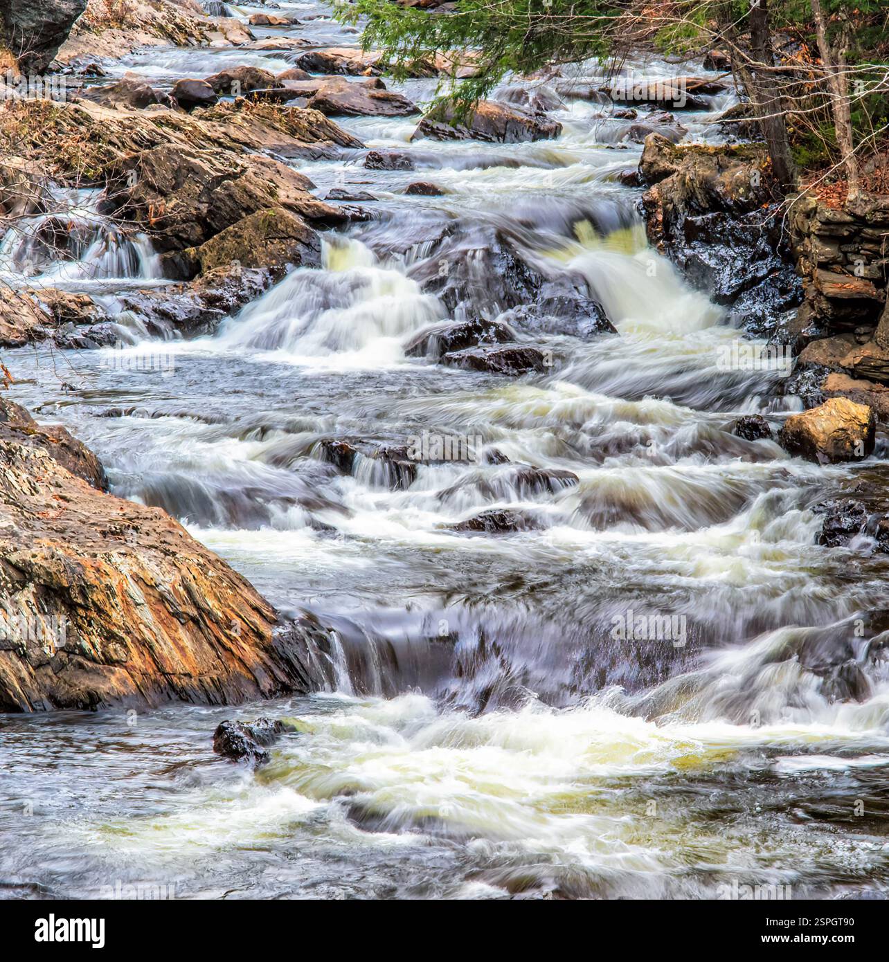Fast moving water rushes over hi-res stock photography and images - Alamy
